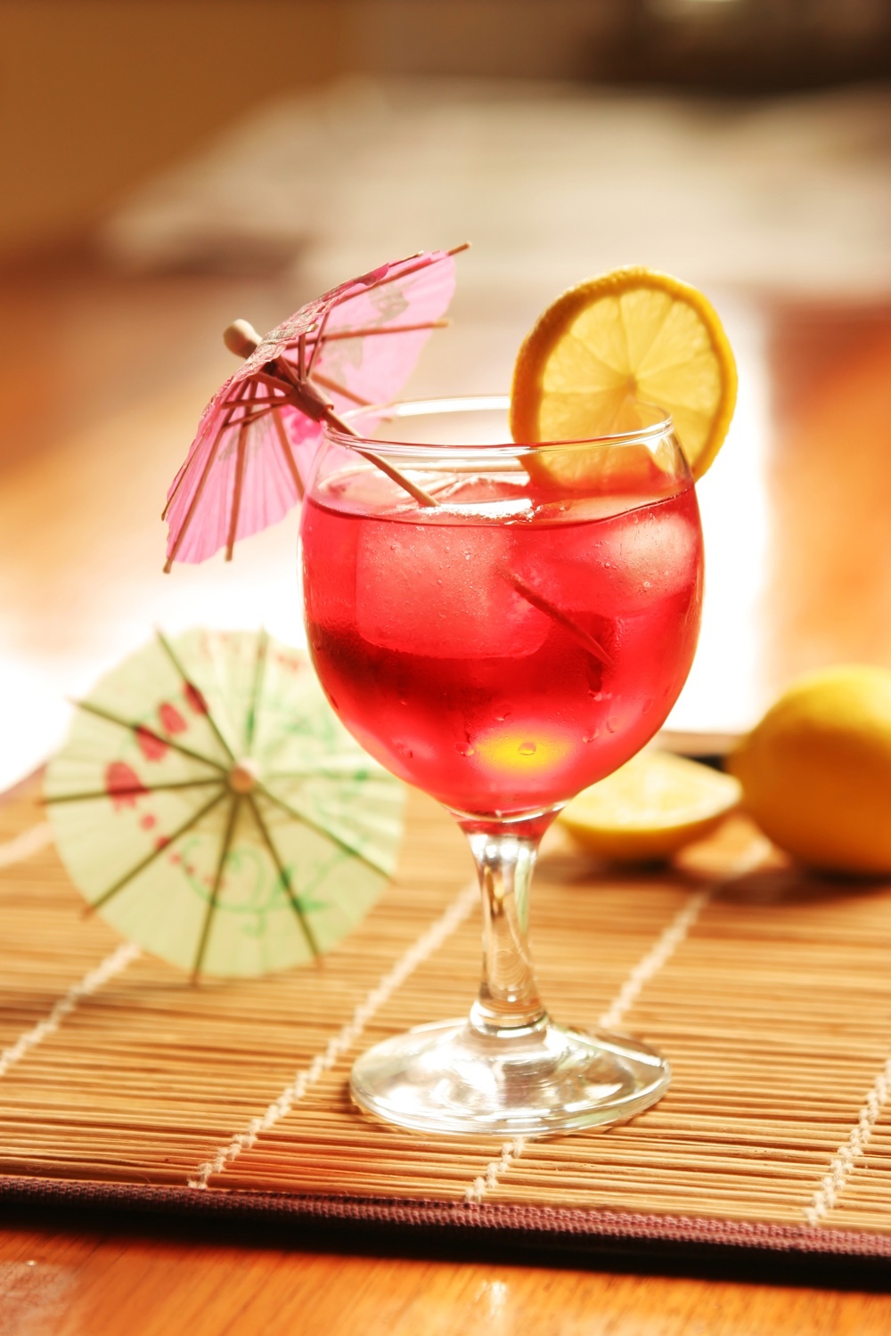 This Pretty Pink Cocktail With It s Umbrella Is Perfect To Serve At A this-pretty-pink-cocktail-with-it-s-umbrella-is-perfect-to-serve-at-a